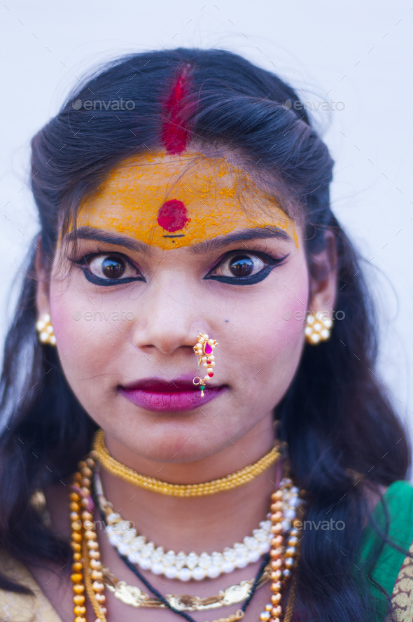 Portrait of beautiful traditional Indian woman Stock Photo by crshelare