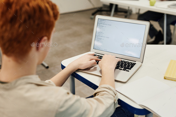 Boy Coding in School Stock Photo by seventyfourimages | PhotoDune