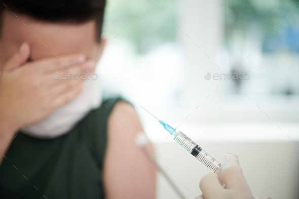 Boy scared of Injections Stock Photo by DragonImages | PhotoDune