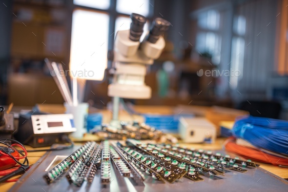 Modern microscope, Panel of LED light indicators is in the production ...