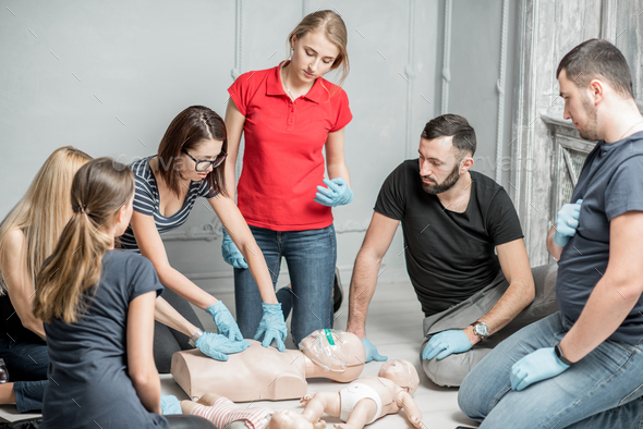 First aid training Stock Photo by RossHelen | PhotoDune