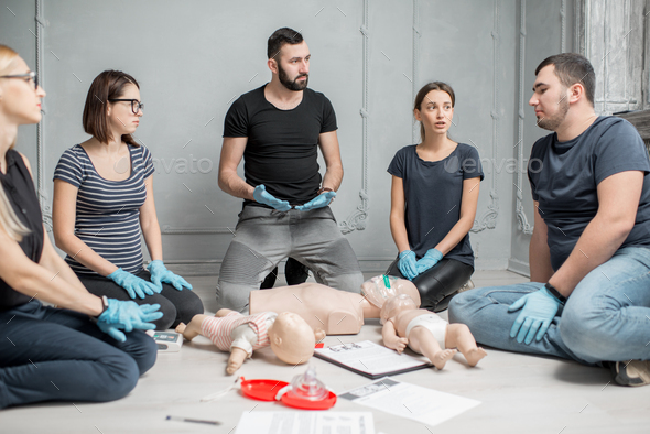 First aid training Stock Photo by RossHelen | PhotoDune