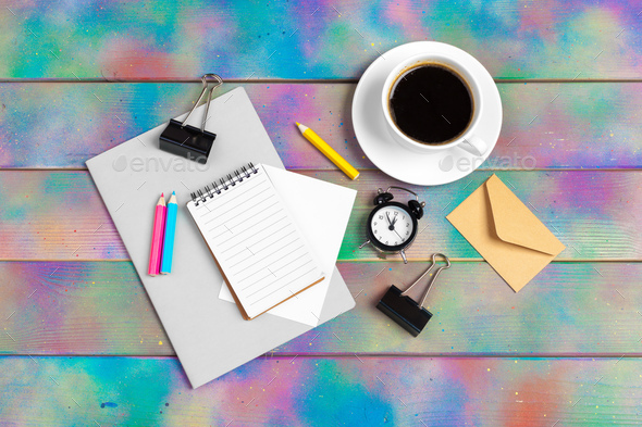 Open binder notebook with coffee cuptop view Stock Photo by FabrikaPhoto