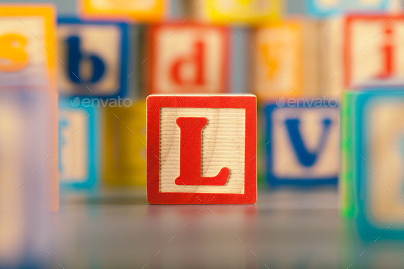 Photograph of colorful Wooden Block Letter L Stock Photo by FabrikaPhoto