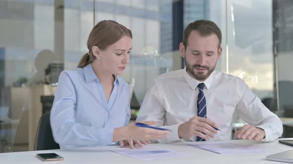 Executive Business People Having Arguments on Documents in Office ...