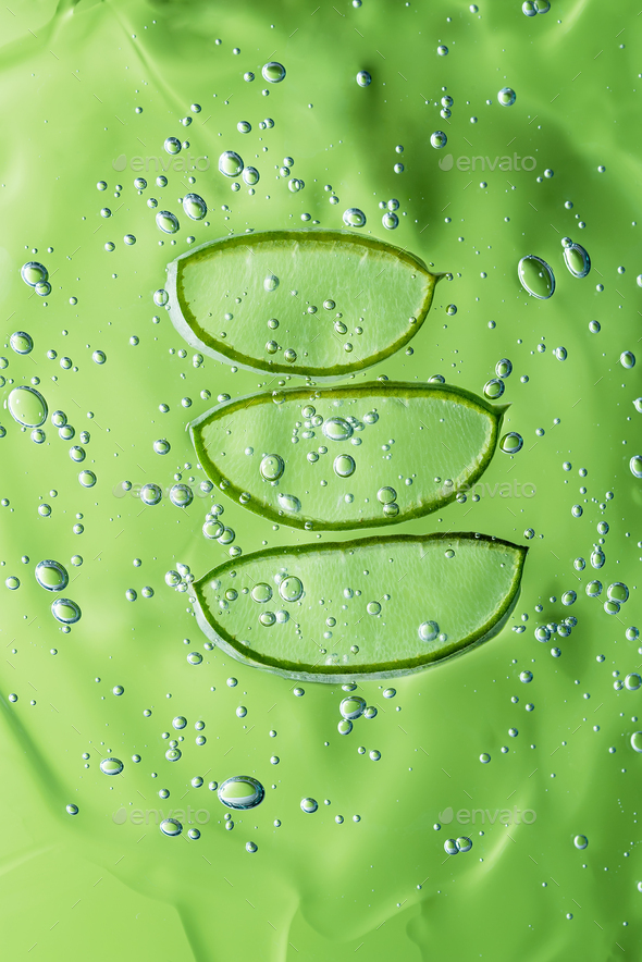 Aloe vera slice texture with gel on blue background. Stock Photo by ...