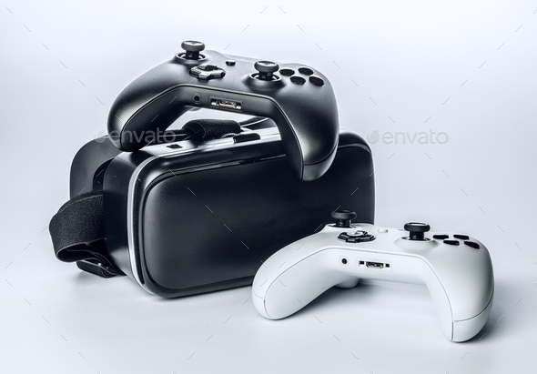 Virtual Reality glasses and game pad Isolated on white background Stock ...