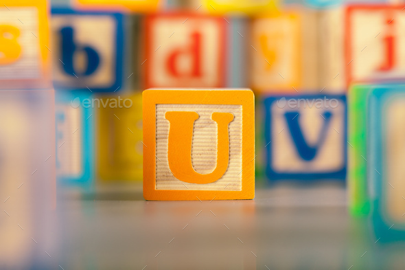 Photograph of colorful Wooden Block Letter U Stock Photo by FabrikaPhoto