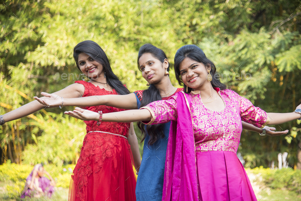 Happy Indian young girls smiling and having fun at outdoor. Stock Photo ...