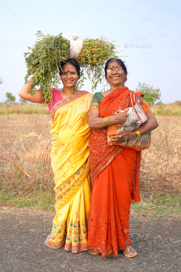 Rural Indian women in the field. Stock Photo by crshelare | PhotoDune