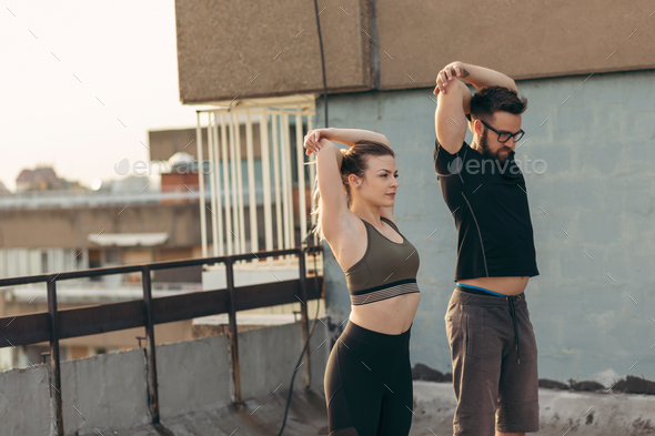 Stretching arms before workout Stock Photo by Impactphotography | PhotoDune