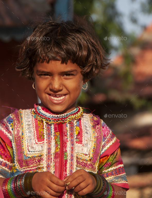 Happy tribal children in traditional clothes, Kutch, Gujarat, India ...