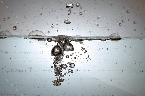 Jet of water forms small water vortex with funnel shape Stock Photo by ...