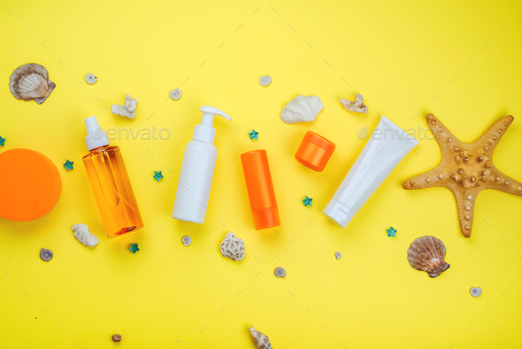 Summer sunscreen cosmetics for holidays with SPF lie in the shape of a ...