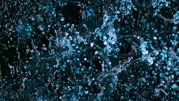 Super Slow Motion Abstract Shot of Splashing Blue Neon Water at 1000Fps ...