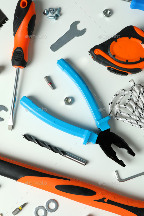 Work tools on white background, top view Stock Photo by AtlasComposer