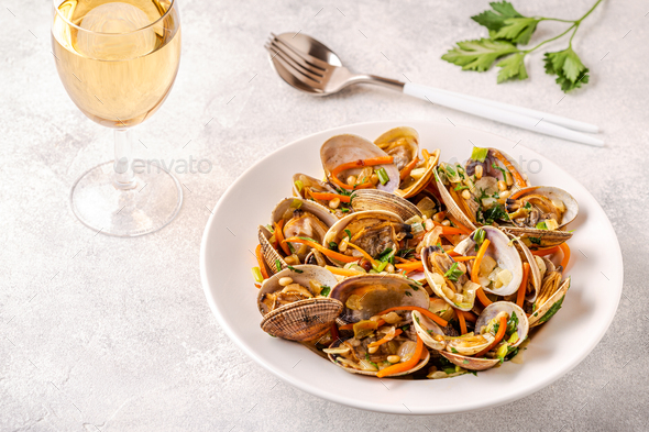 Shells vongole venus clams with vegetables and herbs Stock Photo by ...