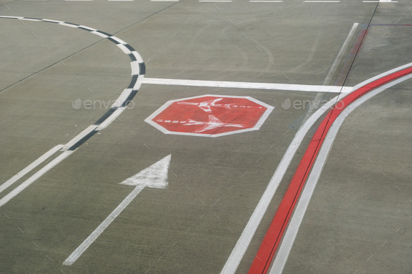 Road sign markings on runway surface for airplane taxiing traffic Stock ...