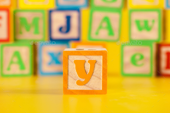 Photograph of colorful Wooden Block Letter Y Stock Photo by FabrikaPhoto