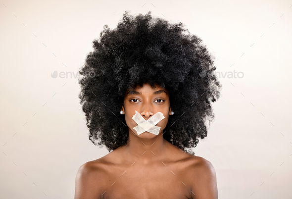 Concept of a censored portrait of a Black woman Stock Photo by Photology75