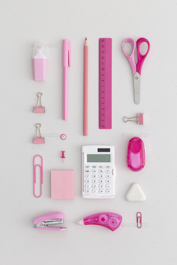Pink school stationery on a grey background. Top view. Flat lay. Back ...