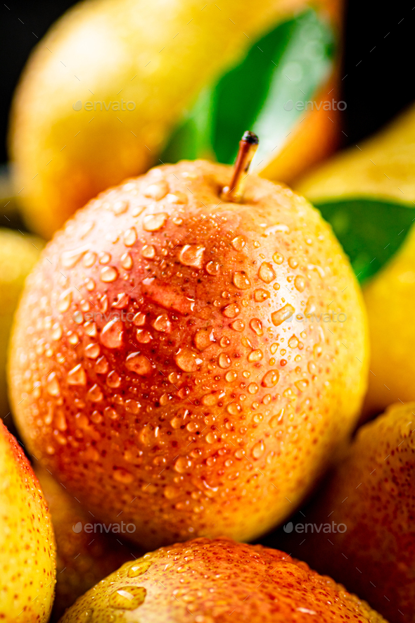 Fragrant pears. Macro background. Pear texture. Stock Photo by ArtemSh2