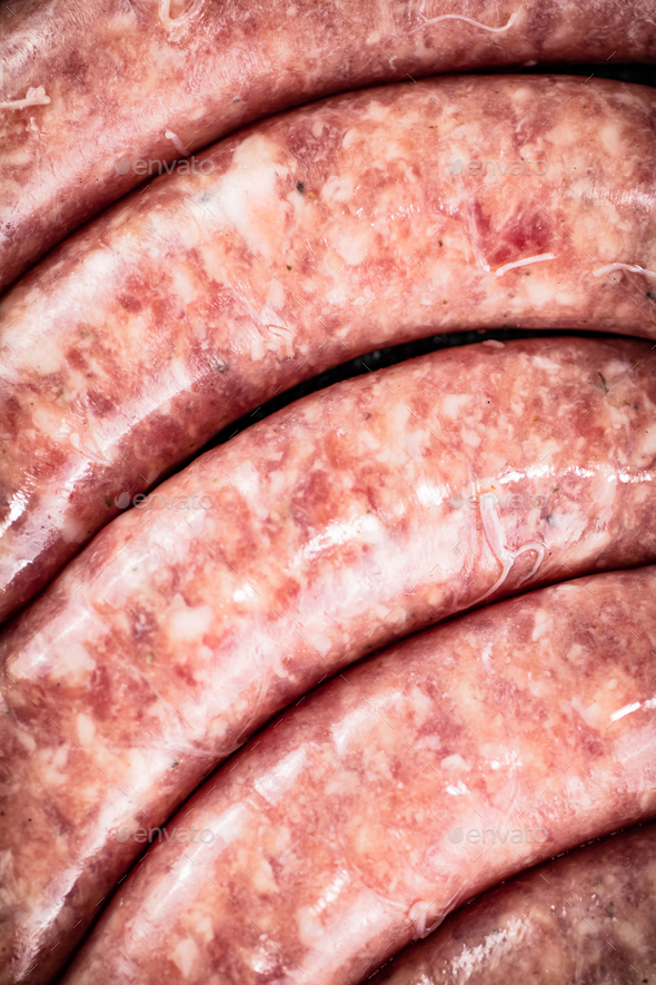 Raw sausages. Macro background. Texture of sausages. Stock Photo by ...