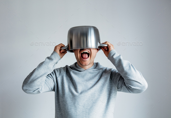 Crying man with pan on head o Stock Photo by Masson-Simon | PhotoDune