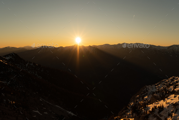 Sun rise over mountain peaks Stock Photo by Pasanheco | PhotoDune