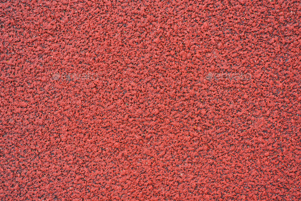 Textured red background, rubber coating for stadiums, running tracks ...