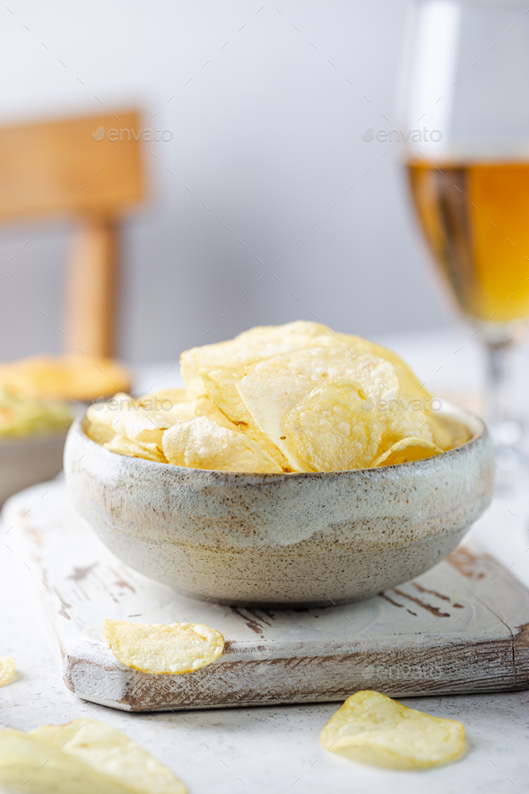 Crunchy delicious potato chips Stock Photo by ipolly80 | PhotoDune