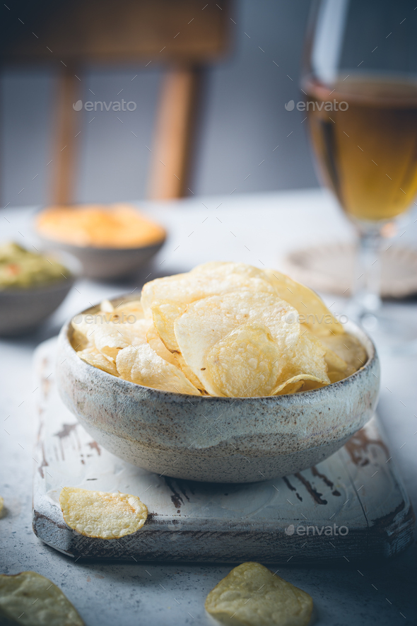 Crunchy delicious potato chips Stock Photo by ipolly80 | PhotoDune