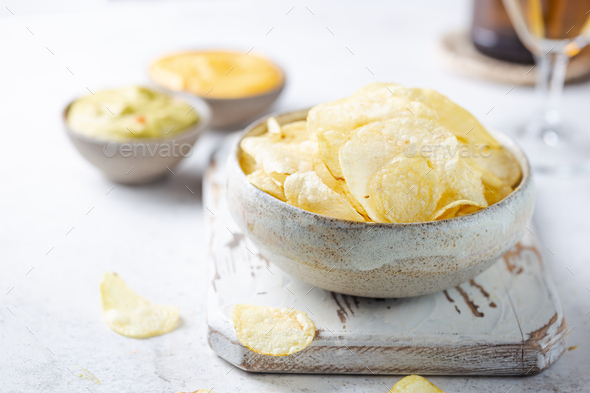 Crunchy delicious potato chips Stock Photo by ipolly80 | PhotoDune