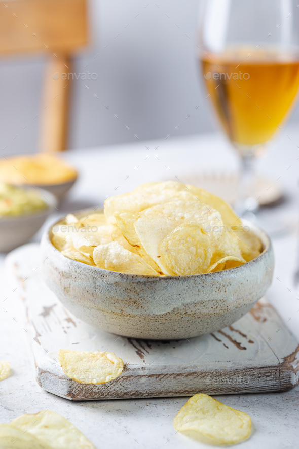 Crunchy delicious potato chips Stock Photo by ipolly80 | PhotoDune