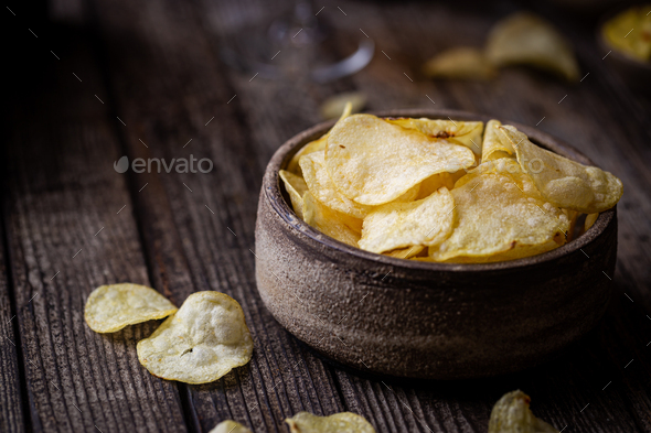 Crunchy delicious potato chips Stock Photo by ipolly80 | PhotoDune