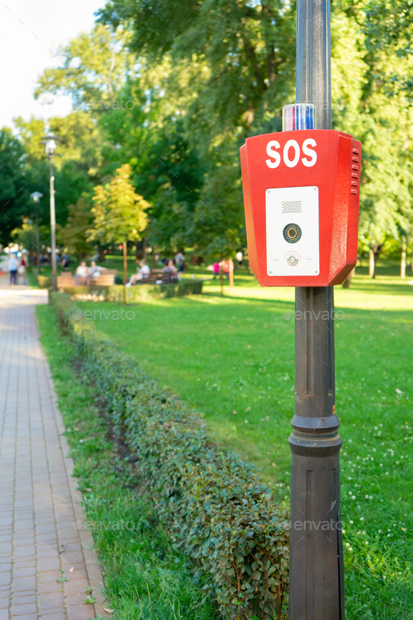 SOS, police, emergency button in the public park. Stock Photo by ...