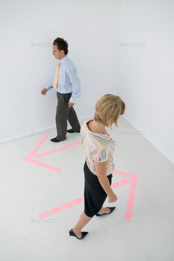 Business people following arrows. Stock Photo by ImageSourceCur | PhotoDune