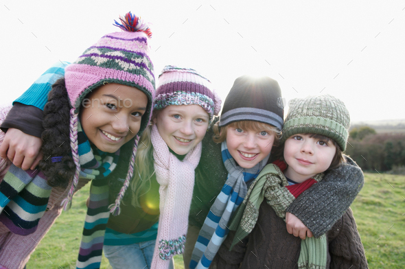 Children playing in field Stock Photo by nualaimages | PhotoDune