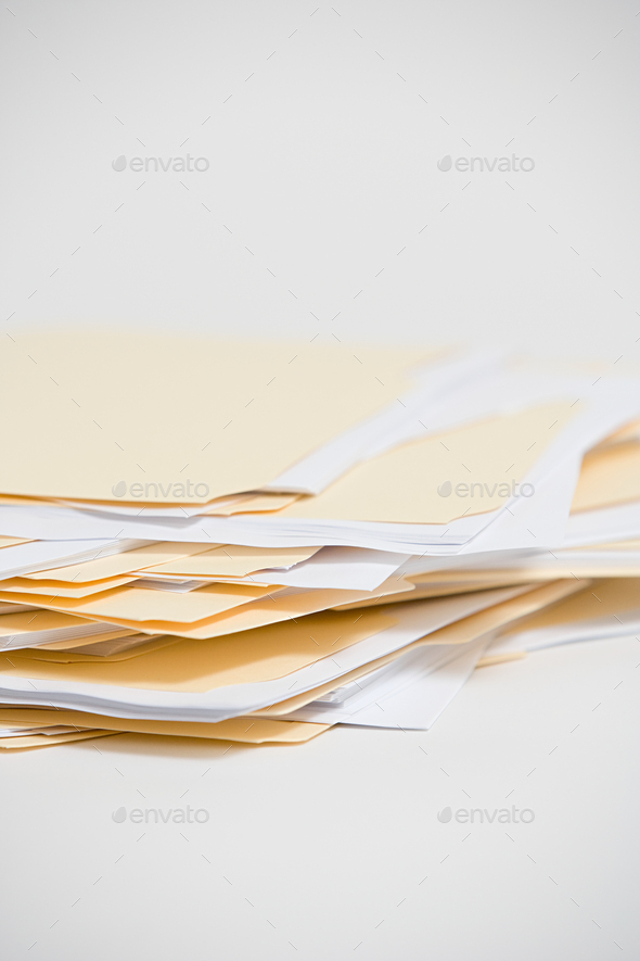 A stack of paperwork Stock Photo by nualaimages | PhotoDune