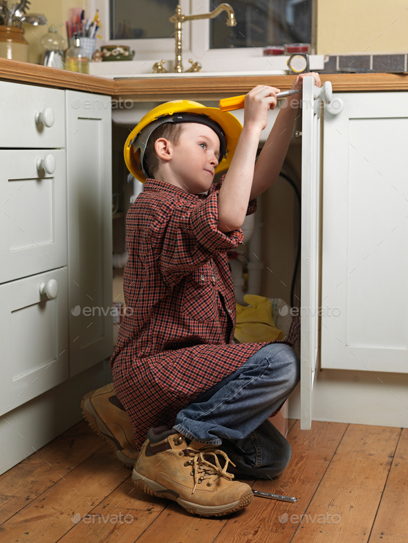 Boy dressed as repair man Stock Photo by ImageSourceCur | PhotoDune