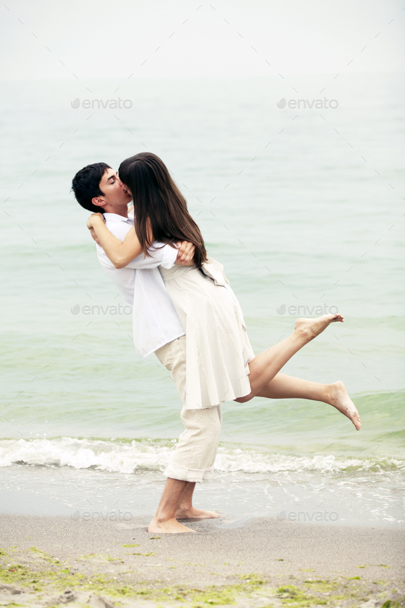 Couple kissing at the beach Stock Photo by Masson-Simon | PhotoDune