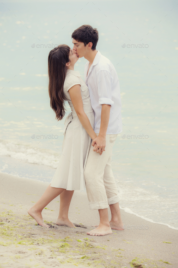 Couple kissing at the beach Stock Photo by Masson-Simon | PhotoDune