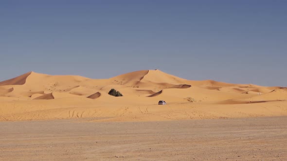 Car Driving Over Sand In Desert Landscape Of Merzouga, Stock Footage