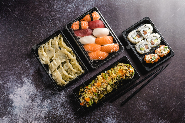 Sushi to go concept. Takeaway box with sushi Stock Photo by MegiasD