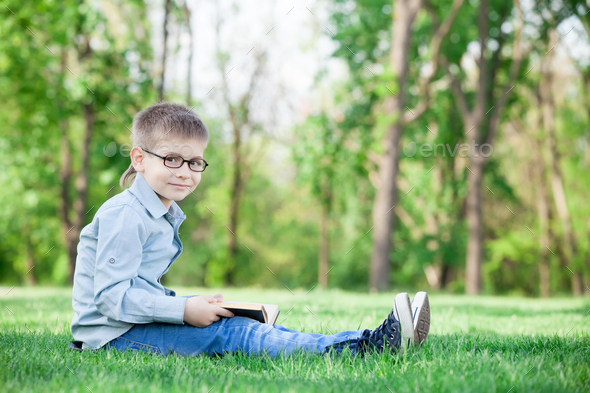 young boy with a book Stock Photo by Masson-Simon | PhotoDune