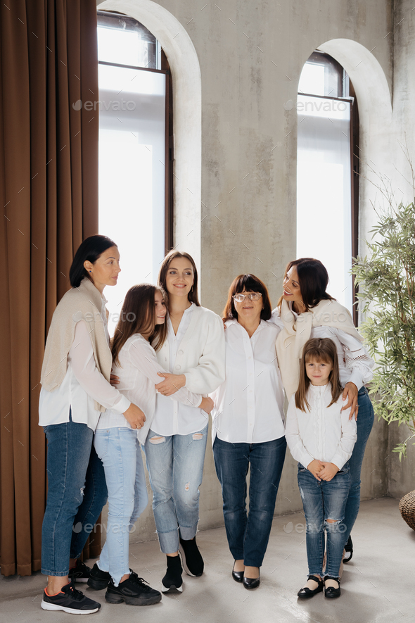 Women of three generations posing at home Stock Photo by diignat ...