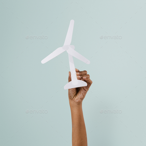 Wind turbine hand renewable energy environment Stock Photo by Rawpixel