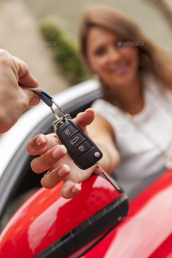 Hand-over of car keys Stock Photo by westend61 | PhotoDune