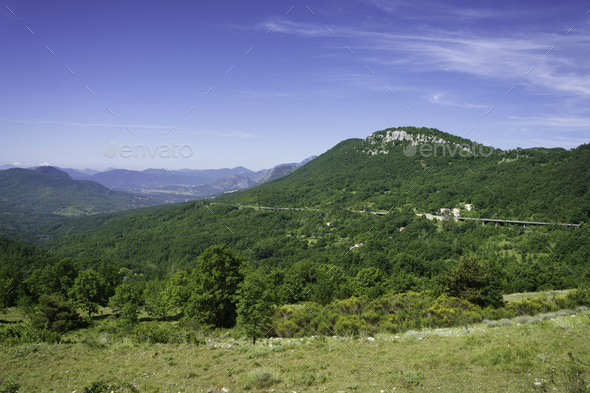 Mountain landscape along the road to Macerone Stock Photo by clodio