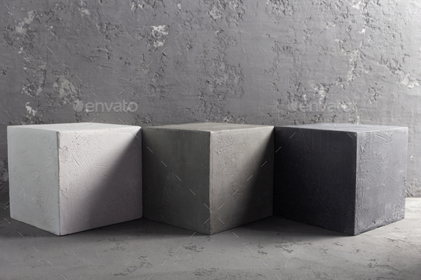 Concrete cube or construction brick at abstract background texture ...